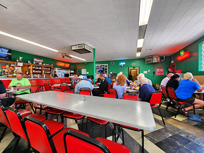 The lunch crowd knows the secret – arrive early, bring cash, and prepare for a burger experience that ruins all other burgers forever.