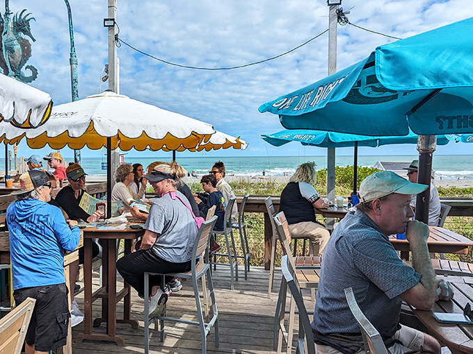 Where strangers become temporary neighbors united by ocean views and good food. The outdoor deck offers front-row seats to nature's greatest show.