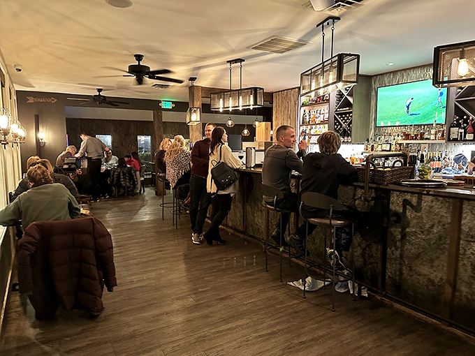 Evening at the bar brings a warm glow and the pleasant hum of people celebrating life's big and small moments over craft cocktails.