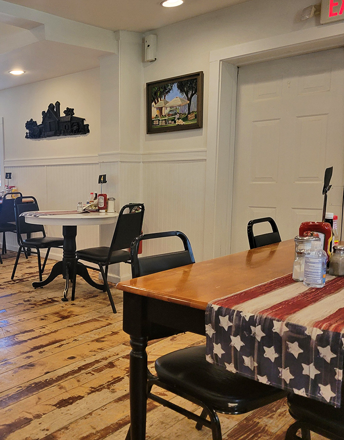 Simple tables, patriotic touches, and walls that could tell stories&mdash;this is where food trumps frills every single time.
