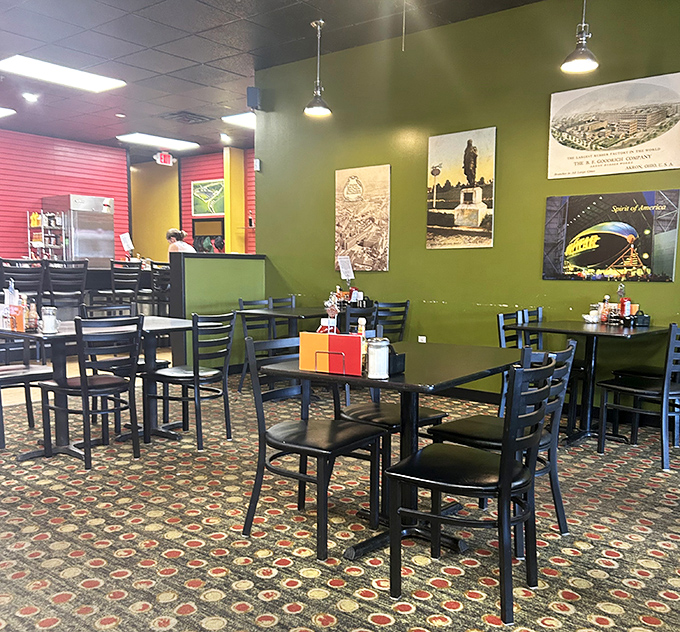 Tables arranged for maximum breakfast enjoyment, with historic Akron images adorning walls that have witnessed countless morning revelations.