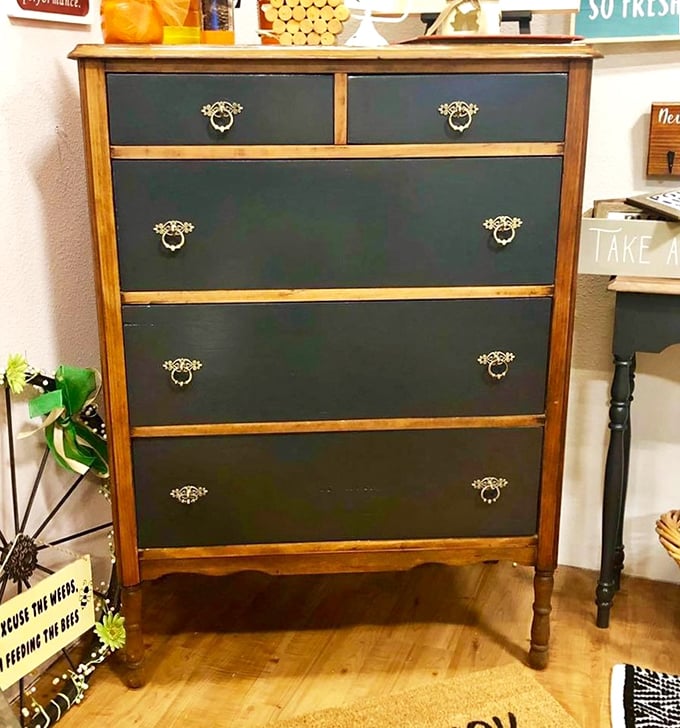 This two-tone dresser with brass pulls isn't just furniture&mdash;it's the perfect marriage of vintage bones and modern style that HGTV dreams are made of.