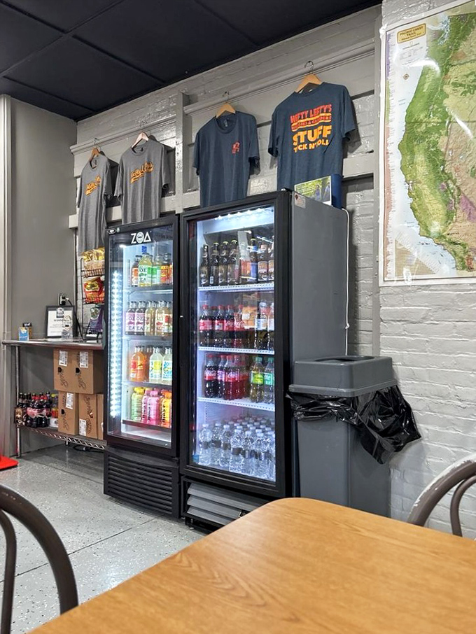 The beverage cooler stands ready, stocked like a convenience store that actually cares about your happiness.