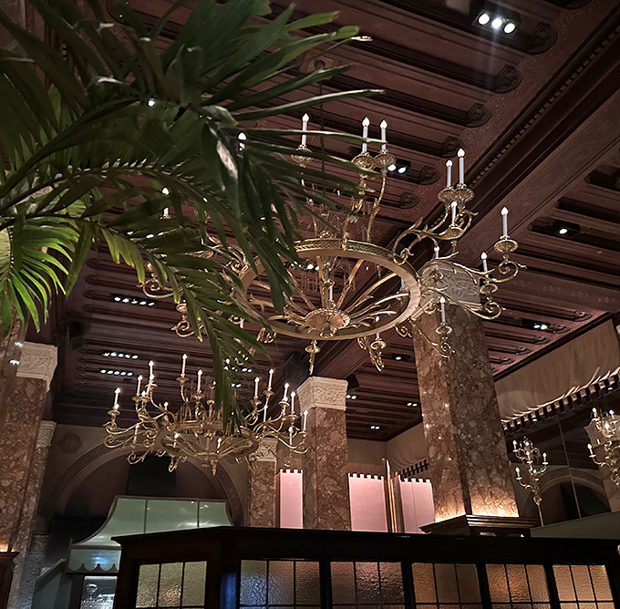 Chandeliers that would make Liberace nod in approval cast a glow that makes everyone look like they've got a filter on.