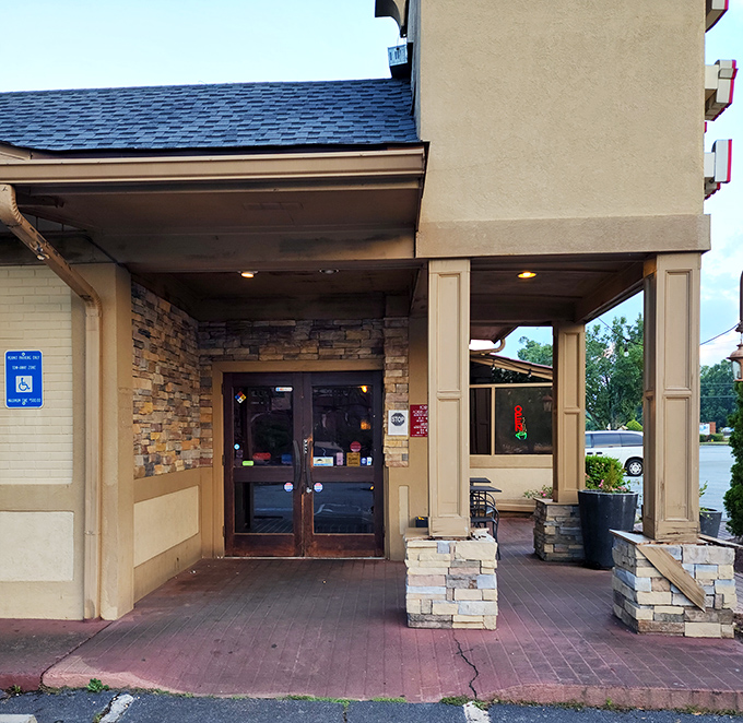 An entrance that promises good things await. Those stone columns aren't just decorative&mdash;they're sentinels guarding the gateway to flavor town.