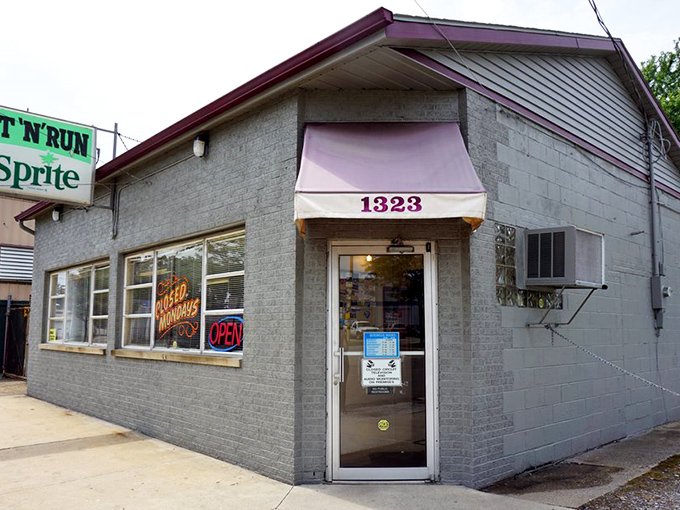 That purple awning and "OPEN" sign beckon like an old friend waving you in for a meal that will make your taste buds stand and applaud.