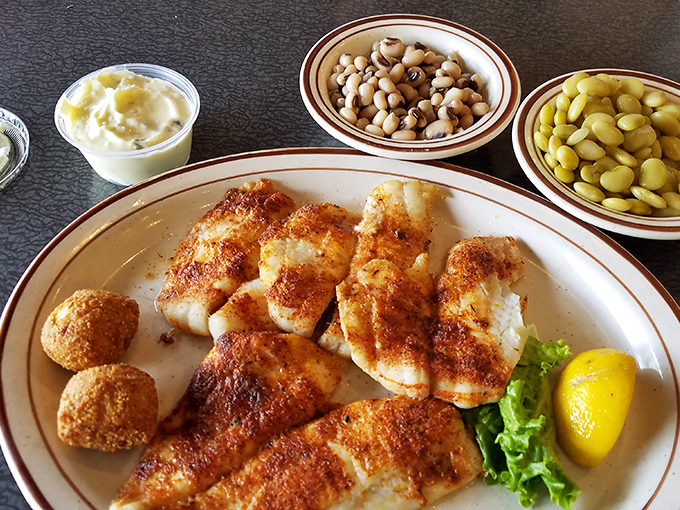 Fish so perfectly golden-crusted it makes you wonder if King Midas has been moonlighting in the kitchen. Those hushpuppies aren't bad either!