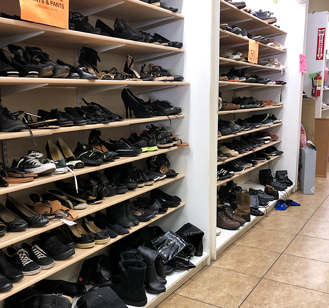 The shoe section – where Cinderella stories begin daily. Somewhere in this footwear forest is a pair with hundreds of miles of adventure still left in them.
