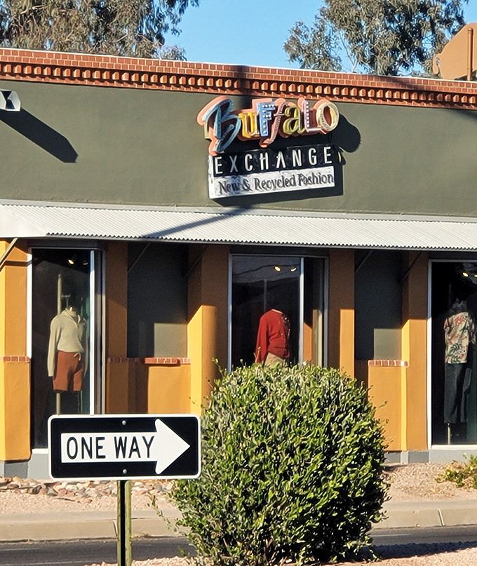 The storefront's earthy palette blends perfectly with Tucson's landscape, while the sign promises fashion adventures inside.
