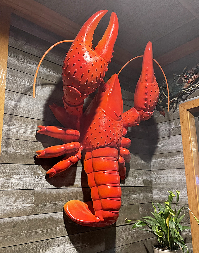 This giant lobster wall sculpture isn't compensating for anything&mdash;the real seafood here is equally impressive in size and flavor.