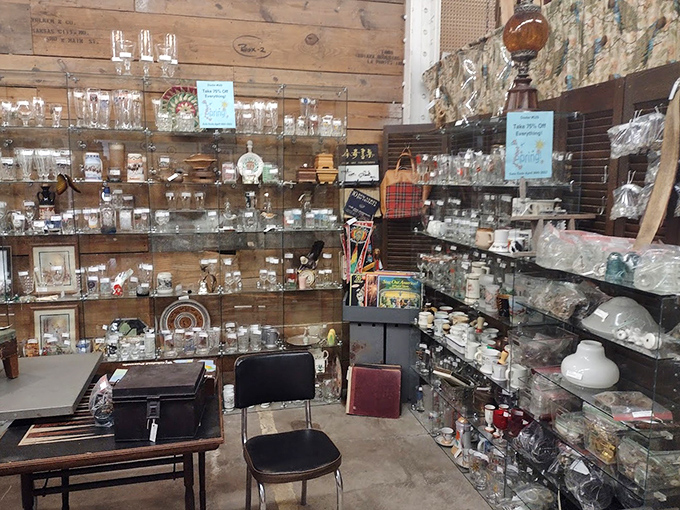 Glassware heaven awaits collectors—each shelf offering crystal, depression glass, and everyday treasures that survived decades of family dinners and celebrations.