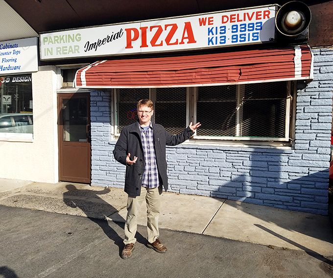 A happy customer showing off his prize. That expression says, "I'm about to have the best lunch in Pennsylvania."