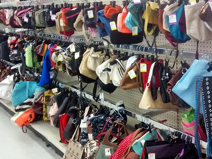 Handbags hanging like ornaments, each one a potential Mary Poppins bag of infinite possibilities and forgotten treasures.