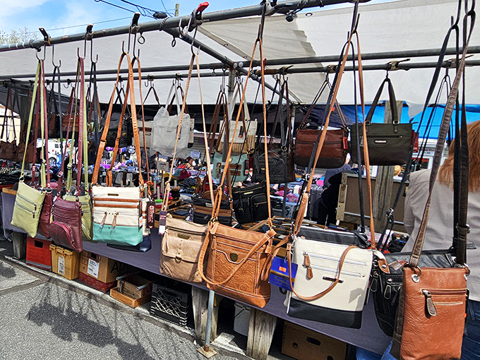 Handbag heaven where leather treasures dangle like fashionable fruit, waiting for someone to rescue them from single life.