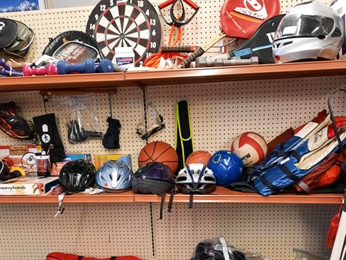 Sports equipment galore! From dartboards to helmets, the makings of your next weekend hobby are lined up for inspection.