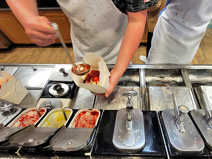 Behind the scenes magic: where ice cream dreams come true. Those stainless steel containers hold more happiness than most bank vaults. 
