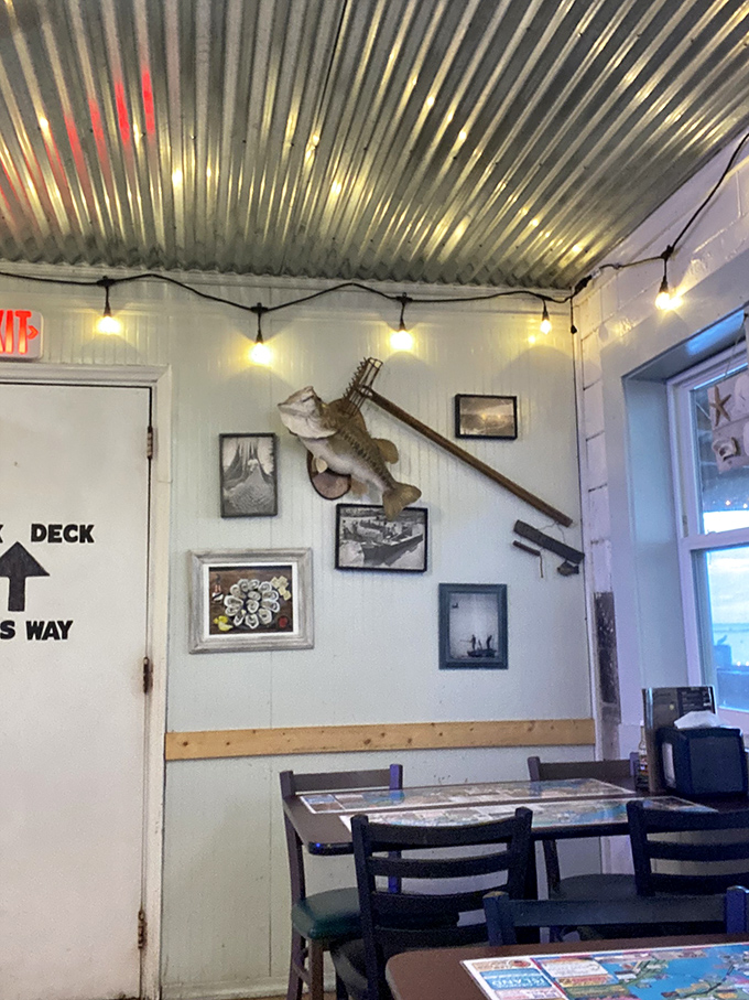 Corrugated metal ceiling, fishing memorabilia, and simple tables&mdash;the dining room decor says, "Focus on the food, not the frills."