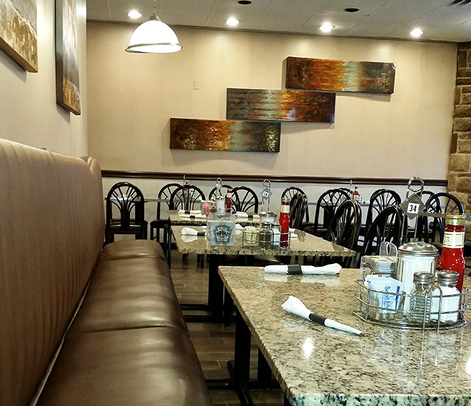 Art that echoes the warm tones of perfectly cooked breakfast foods adorns walls where diners create their own masterpieces&mdash;empty plates.