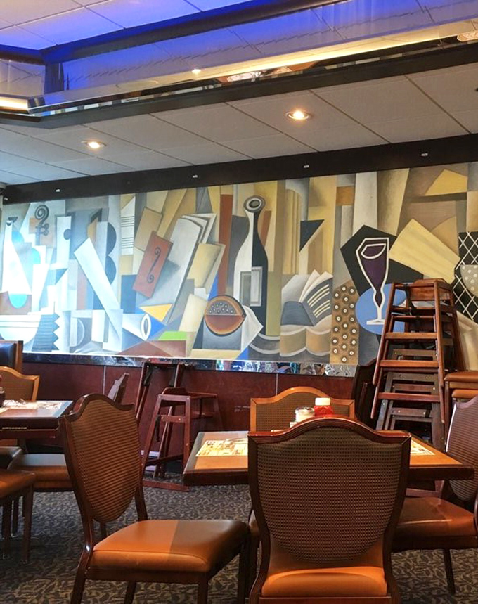 Colorful murals and comfortable seating create an atmosphere where time slows down for good food.