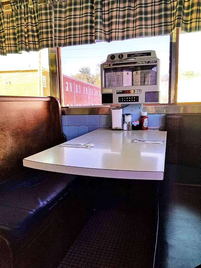 Every booth tells a story, but this one&mdash;with its jukebox and checkered curtains&mdash;could write a novel about American dining culture.