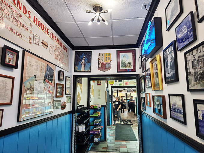 The hallway of fame&mdash;where vintage signs and local memorabilia create the perfect appetizer before your meal arrives.