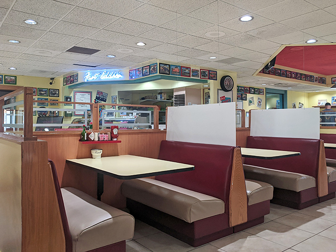Classic diner booths in burgundy and beige&mdash;where countless conversations, first dates, and "remember when" moments have unfolded over decades of pancakes.