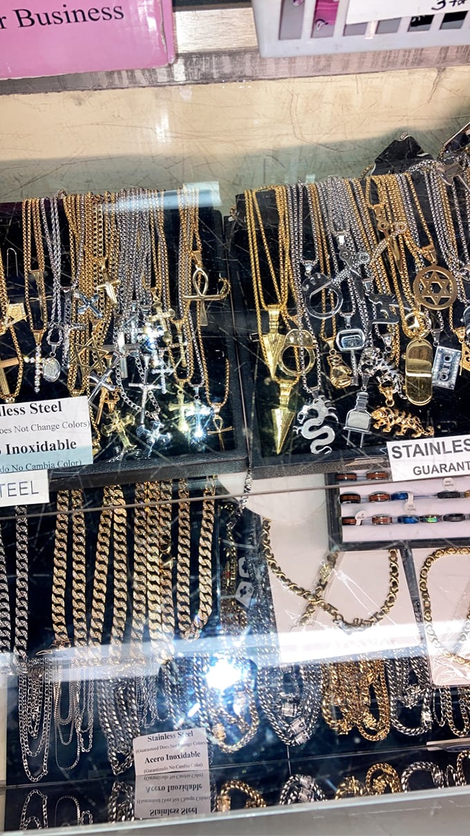 Glittering possibilities under glass. Each pendant and chain waits to become someone's statement piece or cherished gift.