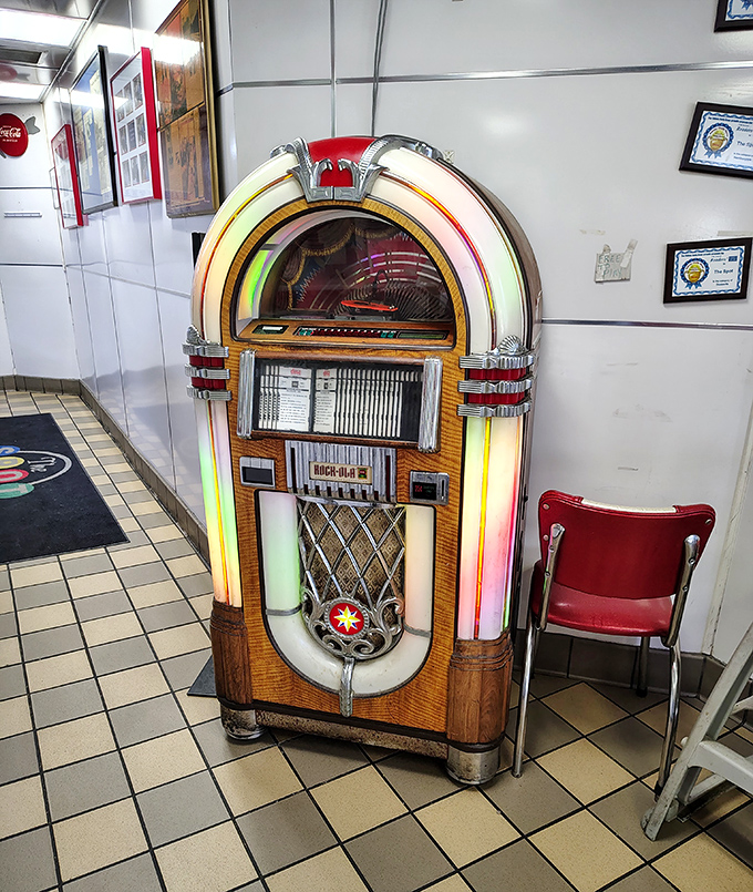 A jukebox that's witnessed more first dates than a high school prom, still glowing with the promise of three-minute musical escapes.
