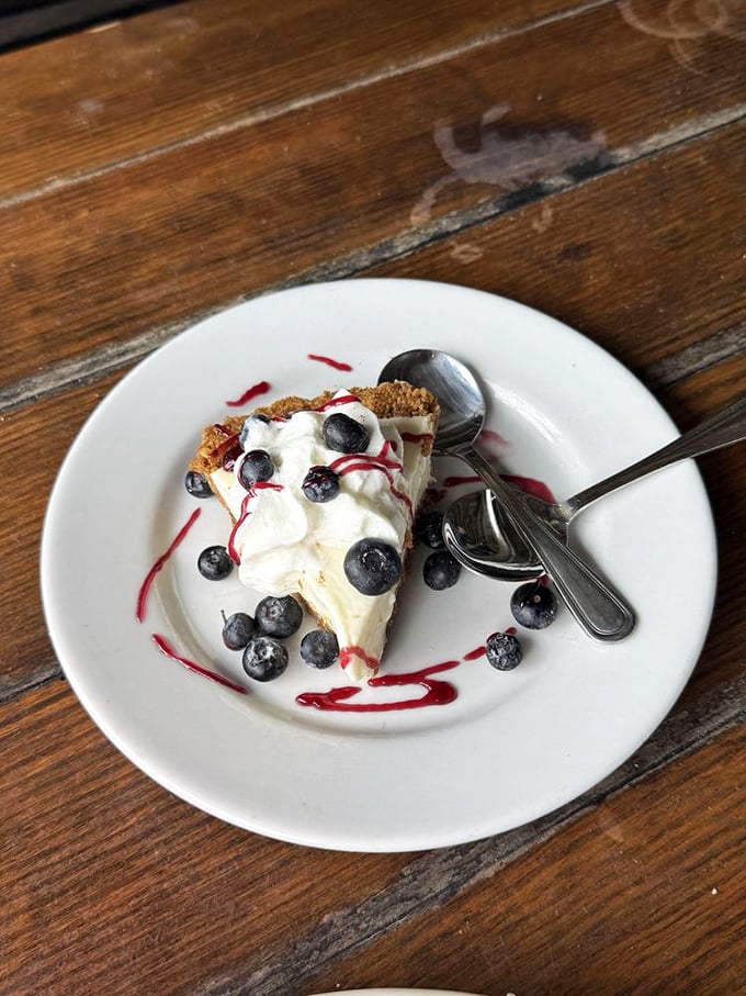 This key lime pie with fresh blueberries isn't just dessert—it's Florida's edible postcard saying "Wish you were here" with every bite.