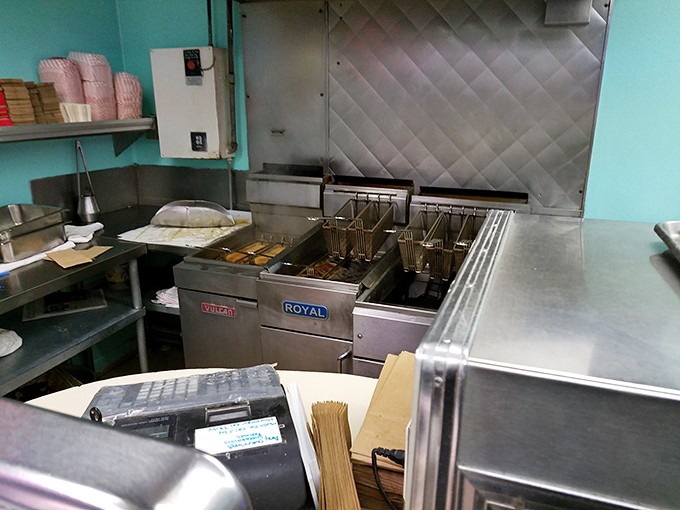 Where the magic happens &ndash; gleaming fryers stand ready to transform ordinary fish into extraordinary memories.