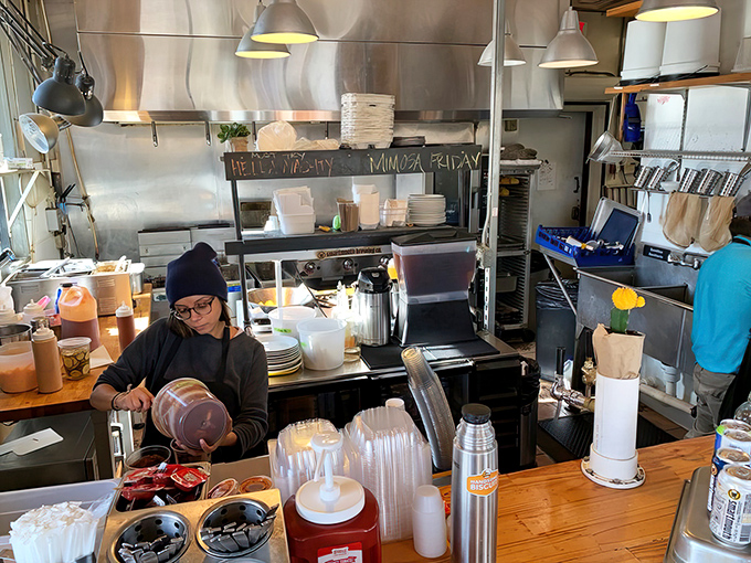 Behind the scenes, culinary magic happens in an efficient kitchen space. Every squeeze bottle and utensil stands ready for biscuit battle.