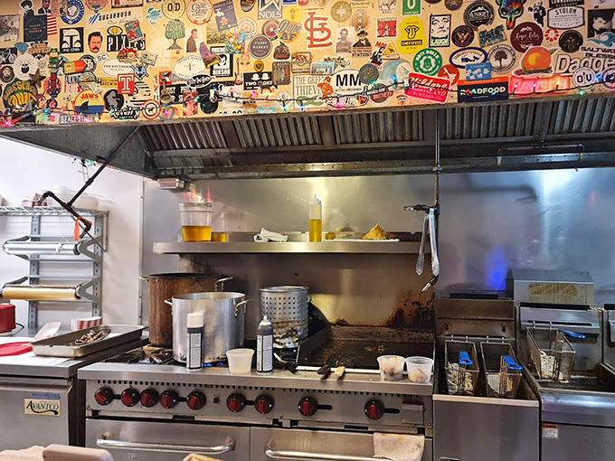 Behind every great seafood joint is a kitchen with character &ndash; this one's ceiling of stickers tells stories of decades of satisfied diners.