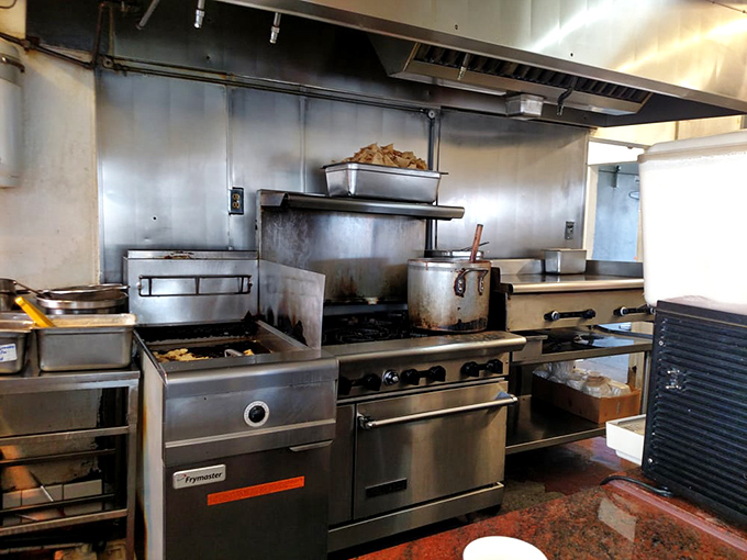The kitchen's stainless steel workhorses – where the magic happens without fanfare, just decades of perfected technique and fresh ingredients.