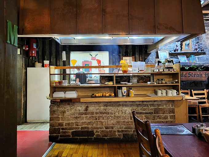 No fancy kitchen theatrics here – just honest cooking happening behind a counter that's seen more culinary magic than most Food Network shows.