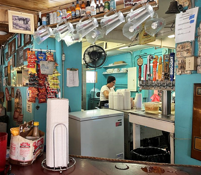 Behind the turquoise walls, magic happens. Simple ingredients transformed into legendary meals by practiced hands.