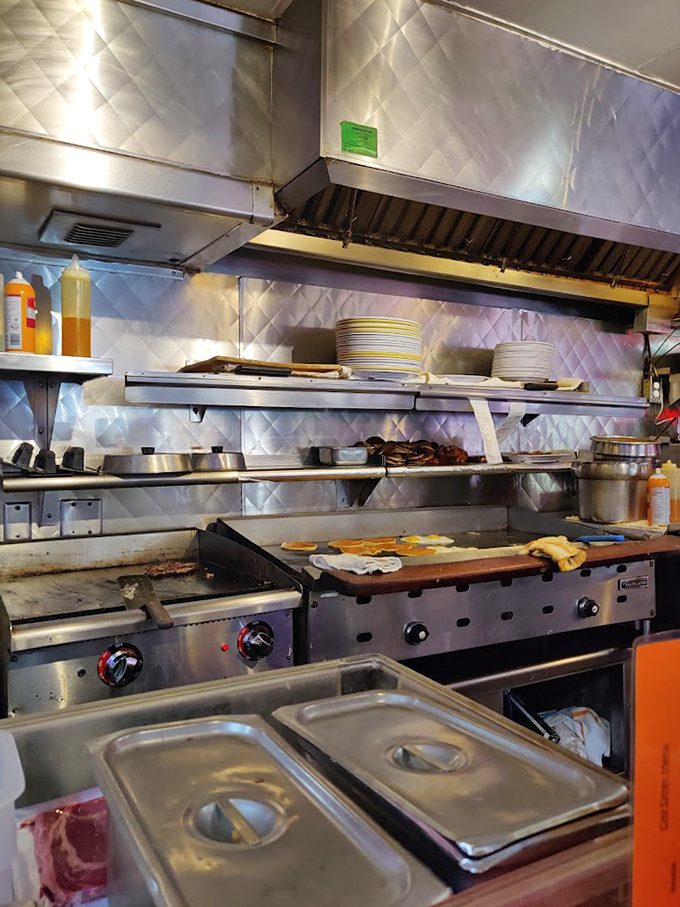 Behind the scenes where breakfast magic happens&mdash;a kitchen symphony of sizzles, flips, and the occasional "order up!"
