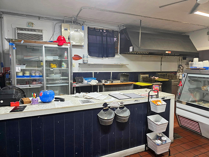 The kitchen &ndash; humble command center where seafood magic happens. No fancy gadgets, just skill and fresh ingredients creating memories on plates.