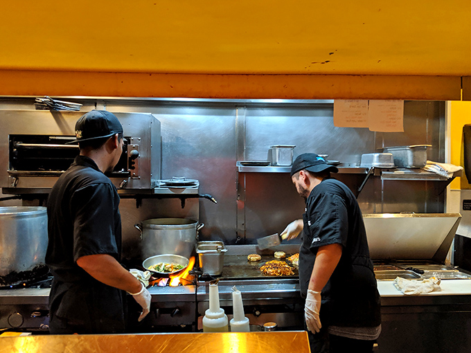 Where the magic happens&mdash;chefs working their seafood sorcery on the grill. Simple tools, extraordinary results.