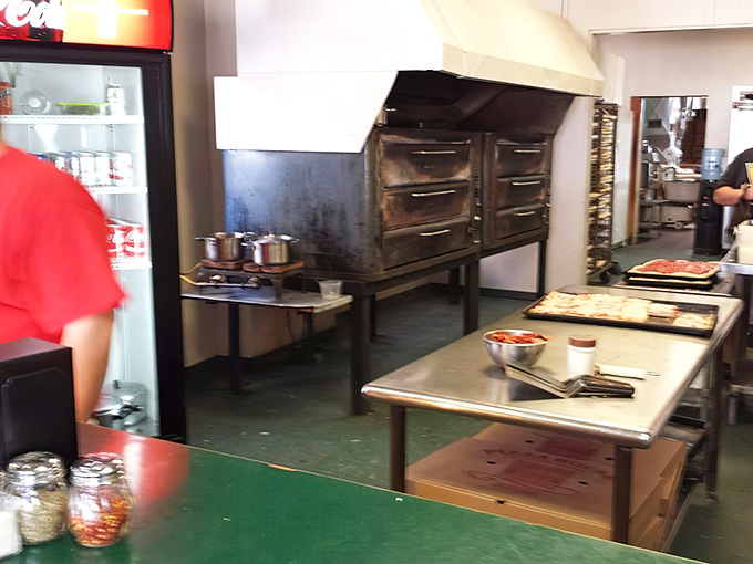 The workhorse ovens have seen decades of service, seasoned with the kind of history you can taste in every bite.