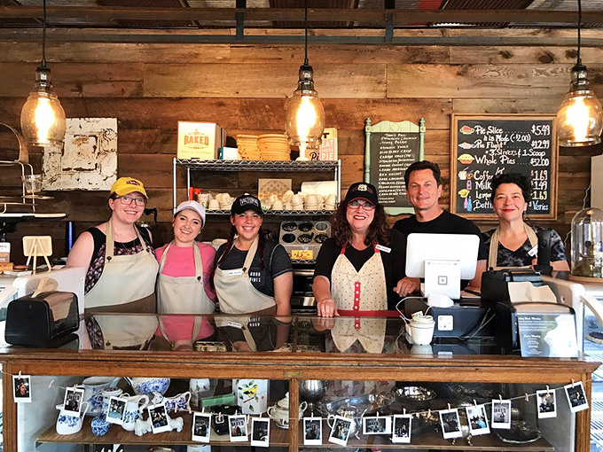 The pie wizards behind the counter, ready to make your dessert dreams come true. These are the faces of people who know the secret to happiness.