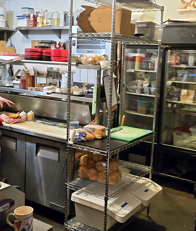 A glimpse into the kitchen reveals the organized chaos where burger magic happens&mdash;no smoke and mirrors, just good ingredients and care.