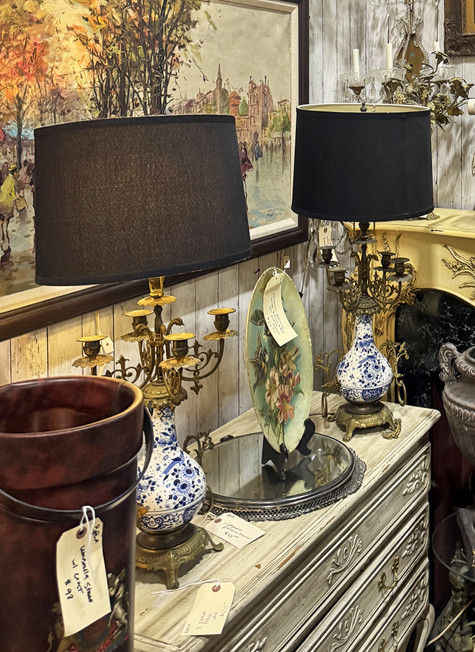 Elegant lamps and blue-and-white porcelain create a vignette worthy of a design magazine. Marie Kondo would approve &ndash; everything here sparks joy.