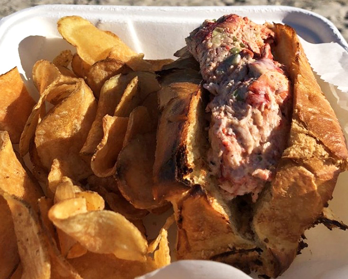 A lobster roll that doesn't need New England's permission to be magnificent&mdash;chunky, buttery, and served with no pretense, just potato chips.