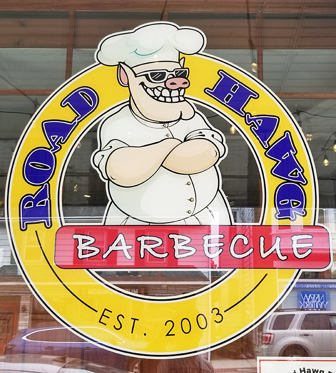 The Road Hawg mascot grins knowingly, like he's in on a delicious secret that you're about to discover for yourself.