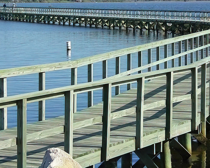 A boardwalk that promises adventure at its end &ndash; or at least the perfect spot to watch the sunset paint the sky.