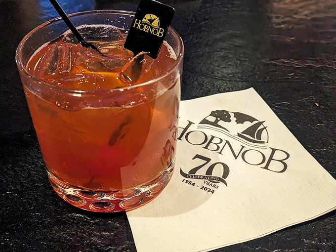 An Old Fashioned worthy of Wisconsin tradition, served with HOBNOB's 70th anniversary napkin&mdash;proof that some things improve with age.