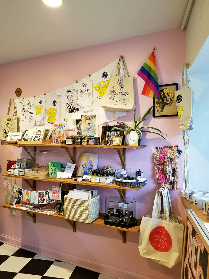 A pink wall of treasures &ndash; from tote bags to local art &ndash; proves this isn't just a place to eat, but a celebration of community creativity.