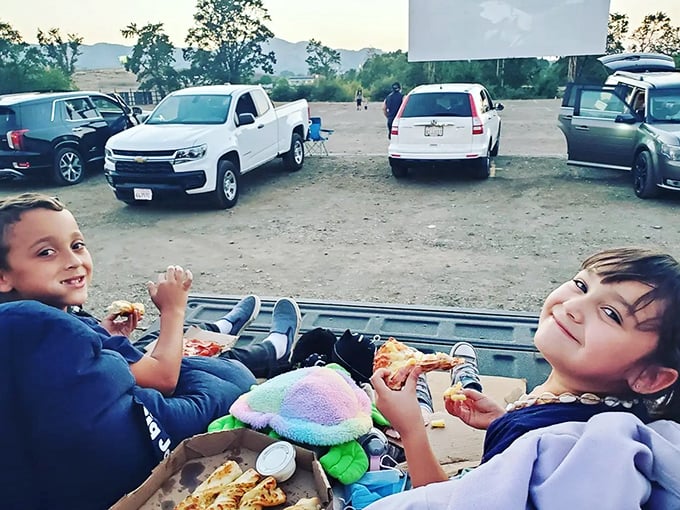 Tailgate dining elevated to an art form&mdash;these young moviegoers have mastered the delicate balance of comfort food and comfortable seating.