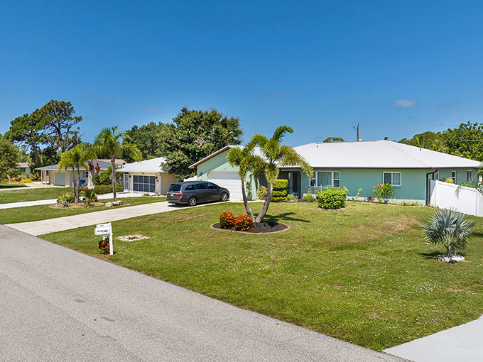 Modest homes with tropical landscaping where neighbors actually know each other's names and "keeping up with the Joneses" means matching their kindness.
