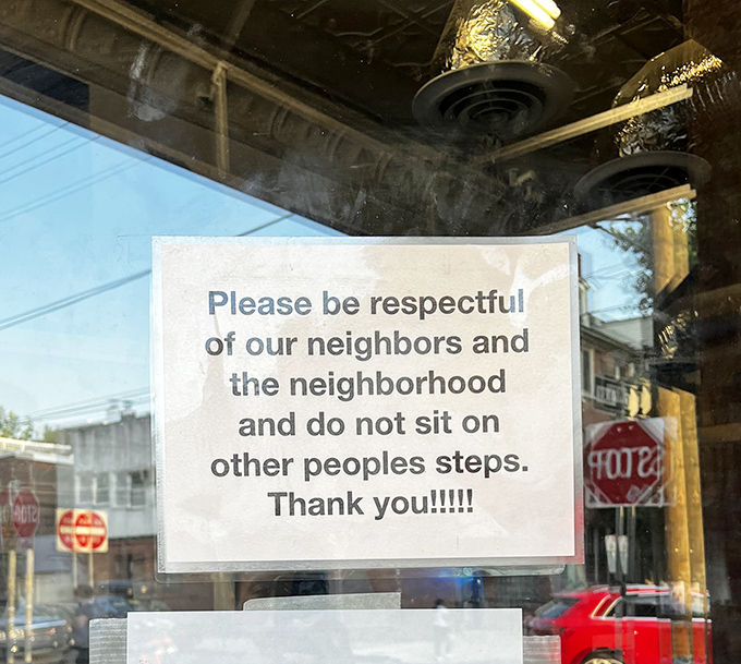 A polite reminder that even food paradise has rules. Respect the neighbors&mdash;they're the ones who let you know about this place!
